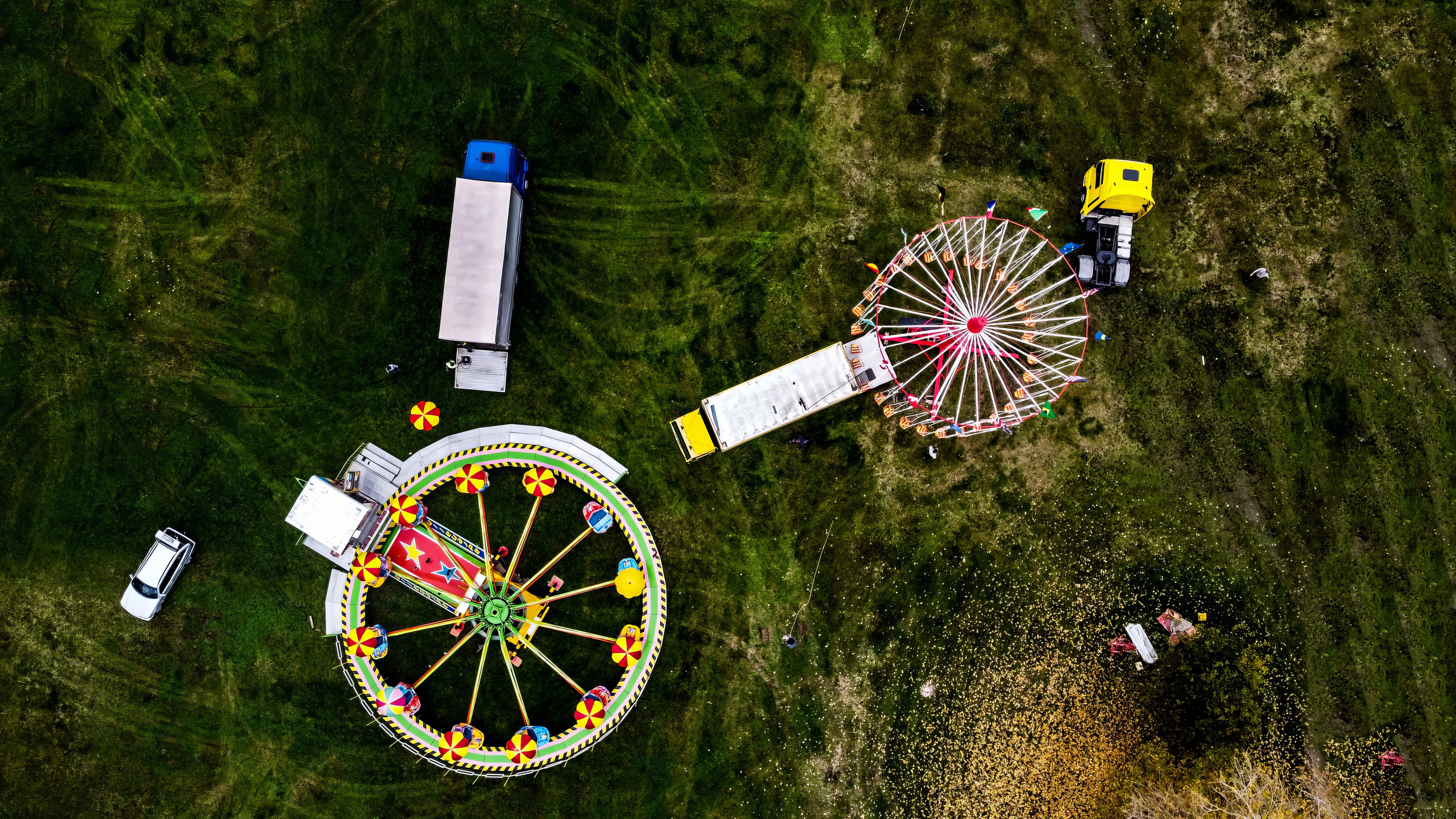 aerial fairground, Ferris wheel, amusement park setup, colorful ...