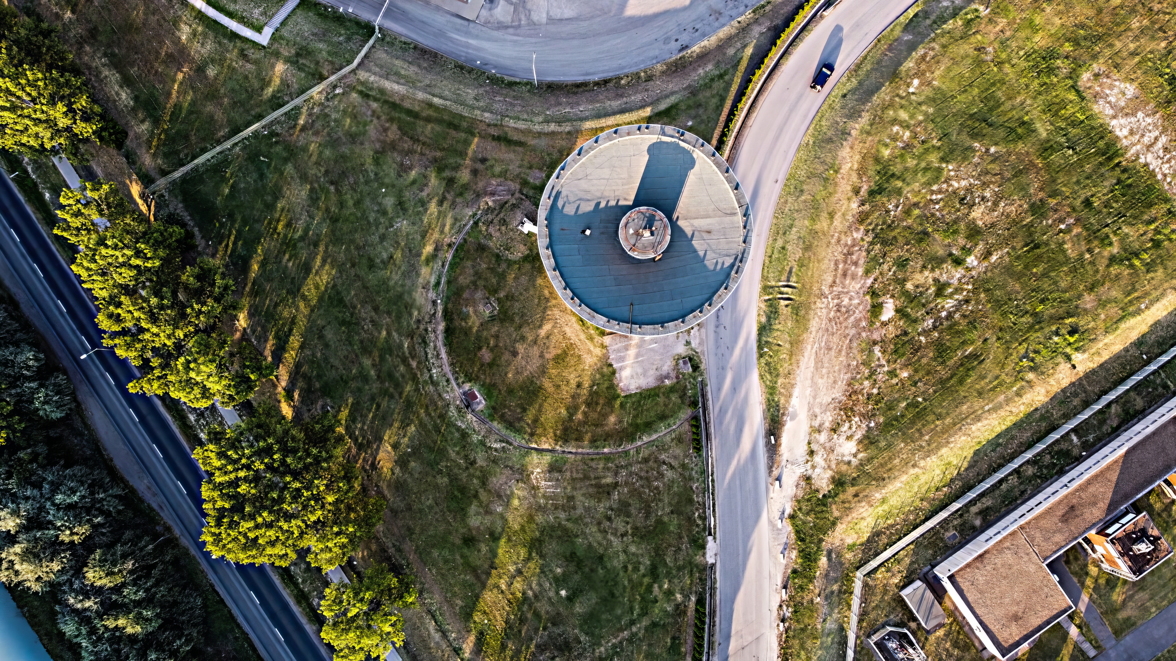 Circular Tower at Road Intersection - Payhip
