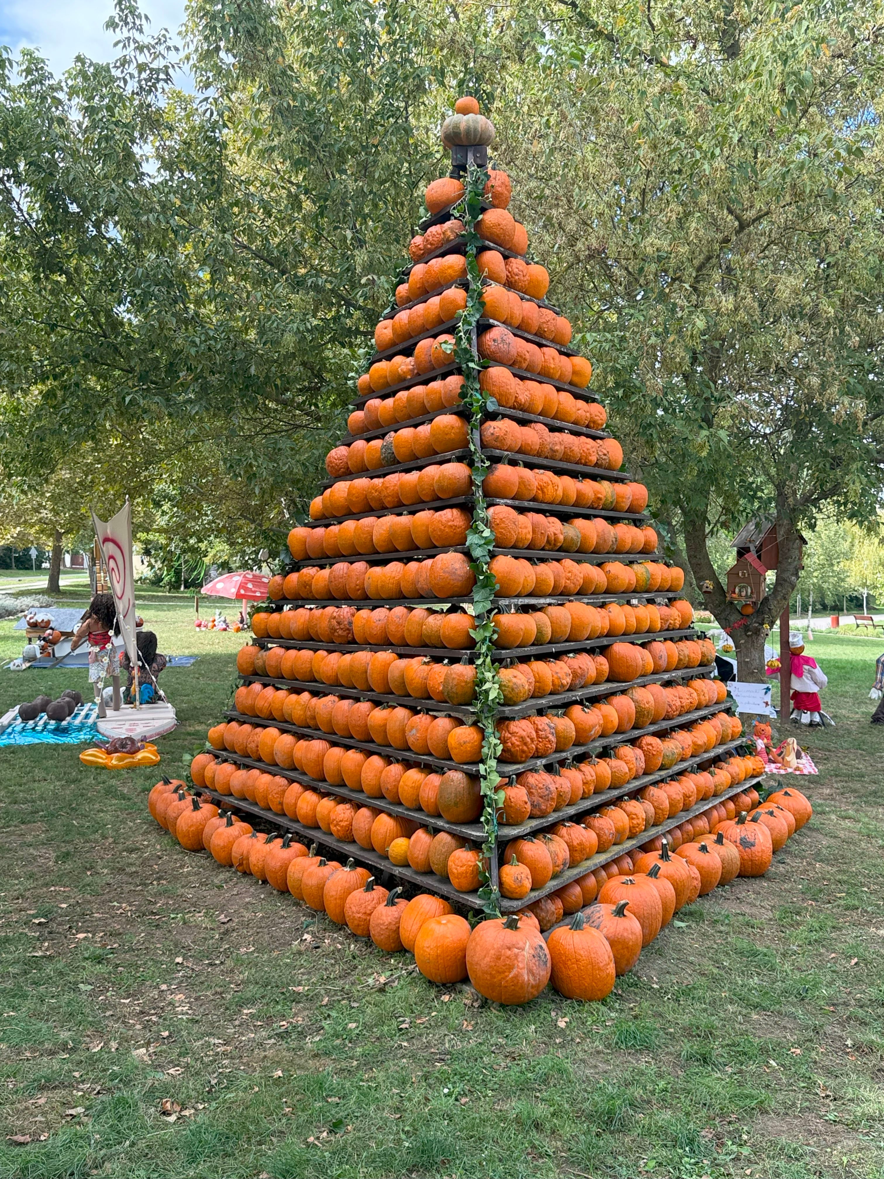 Pumpkin pyramid built outdoors in autumn - Payhip
